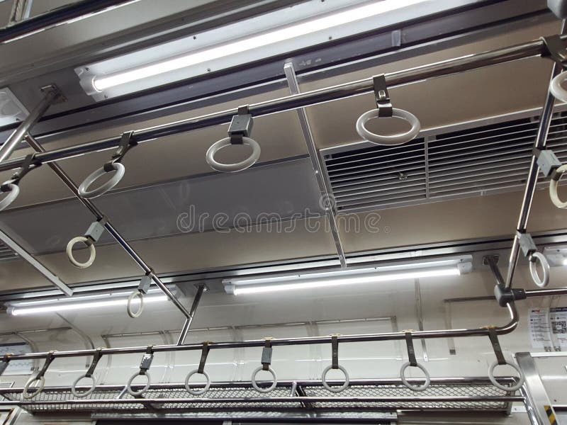 The Hand Handle or Handgrips or Handrails of Commuter Line Passengers ...