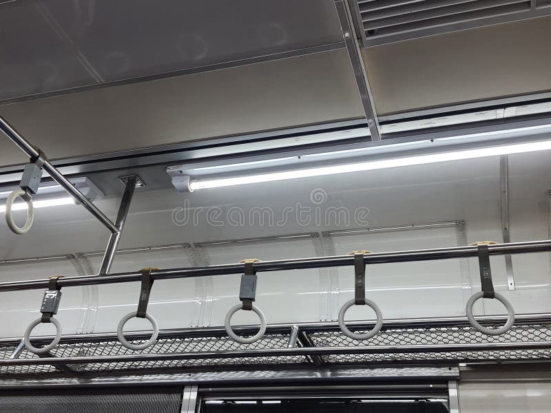 The Hand Handle or Handgrips or Handrails of Commuter Line Passengers ...