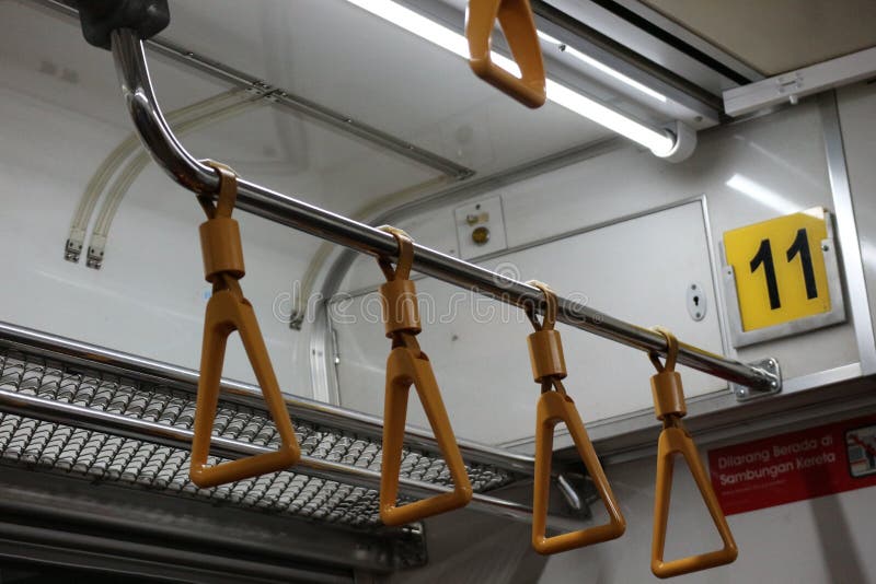 The Hand Handle or Handgrips or Handrails of Commuter Line Passengers ...