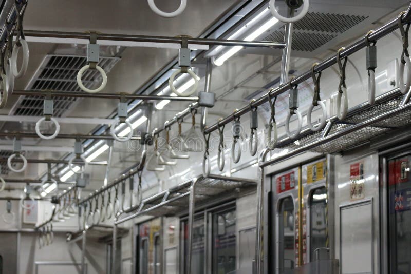 The Hand Handle or Handgrips or Handrails of Commuter Line Passengers ...