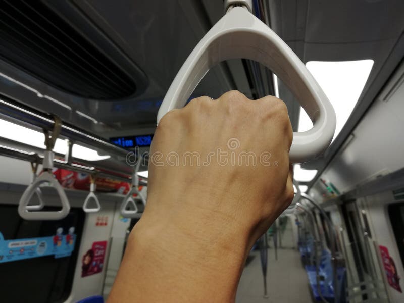 Hand is Held on the Handle of the Subway Stock Photo - Image of ...