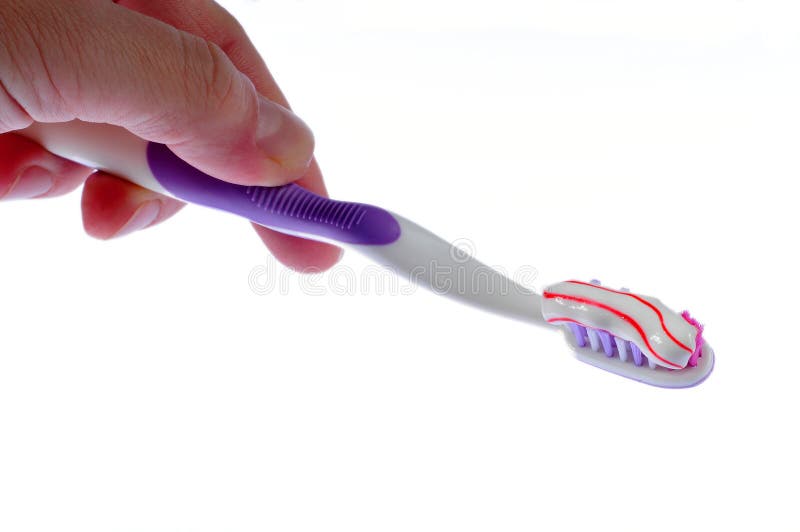 Hand Handling Toothbrush Covered by Toothpaste Iso Stock Image - Image ...