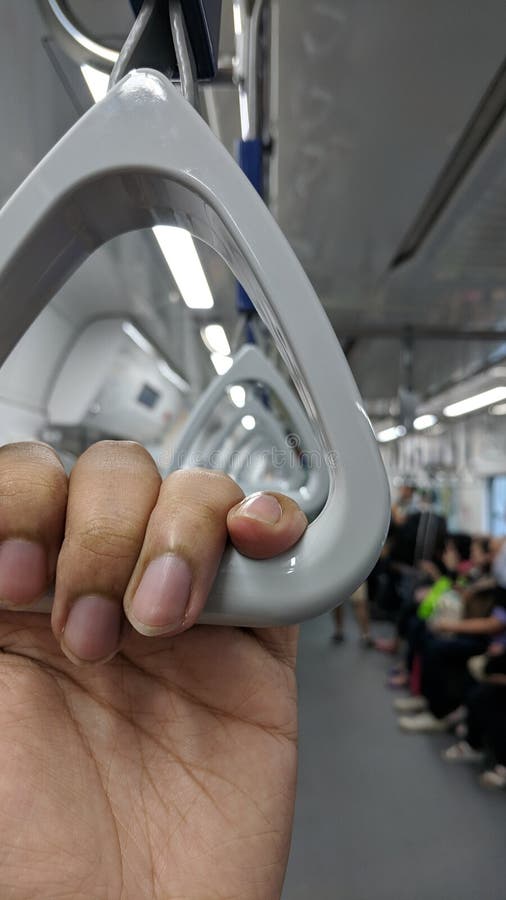 A Hand with Handrail Inside Underground Metro Train Jakarta Stock Image ...