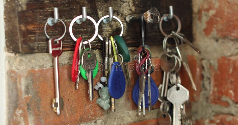 Hand Hangs on a Hook a Bunch of Keys Stock Video - Video of keychain ...
