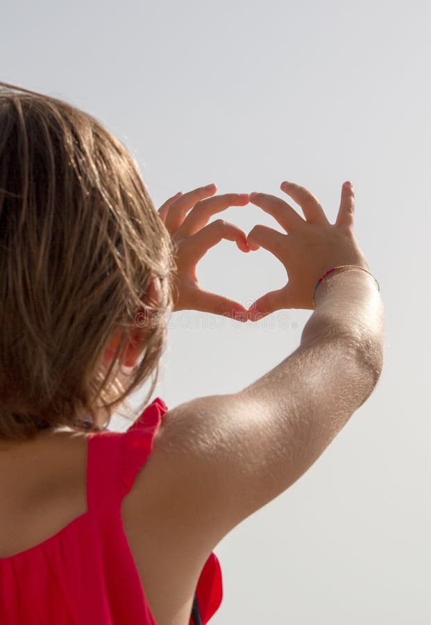 Hand Heart stock photo. Image of young, hands, beach - 61679094