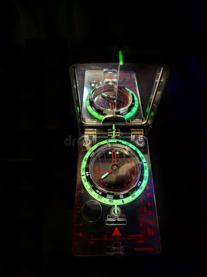 Hand-held Compass at Night with Glowing Dial Stock Photo - Image of ...