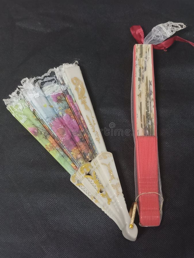 Hand Held Fan stock image. Image of held, brand, hand - 226848985