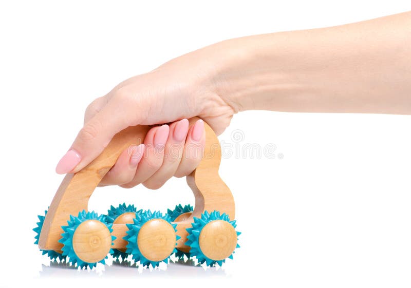 Hand-held massager in hand stock image. Image of device - 126813513