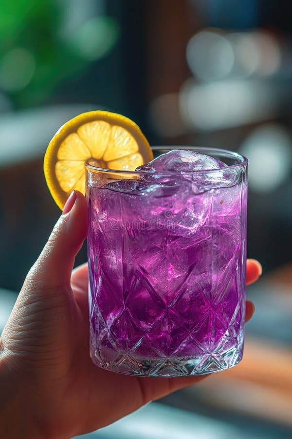 Hand-held Purple Ice Tea stock photo. Image of purple - 358518108