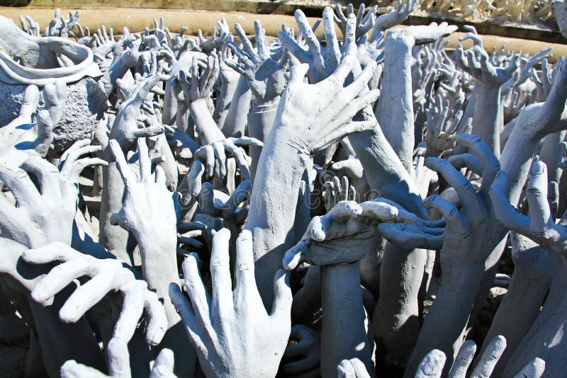 Hand from Hell at Rong Khun Temple Stock Image - Image of reflection ...