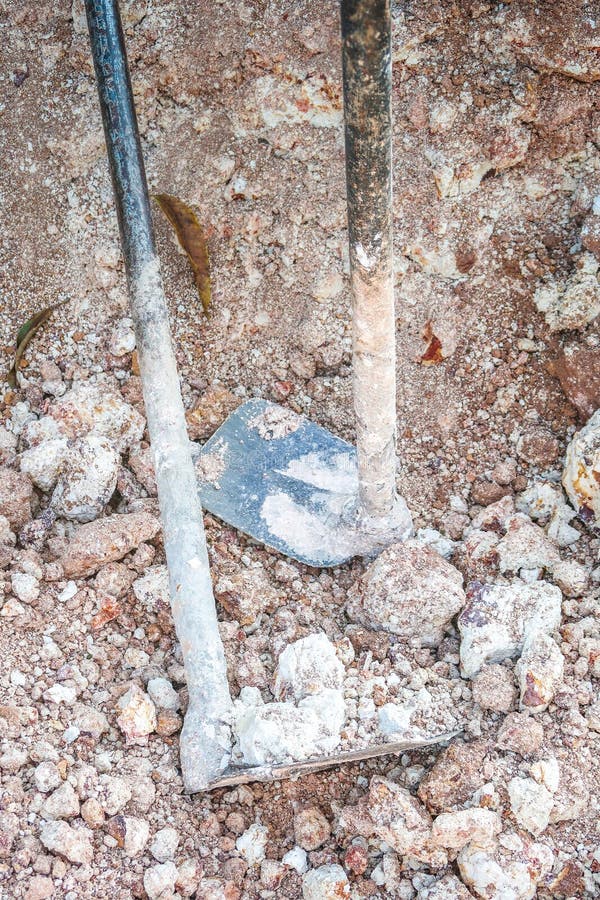 Hand hoe dig the soil stock image. Image of excavator - 162554647