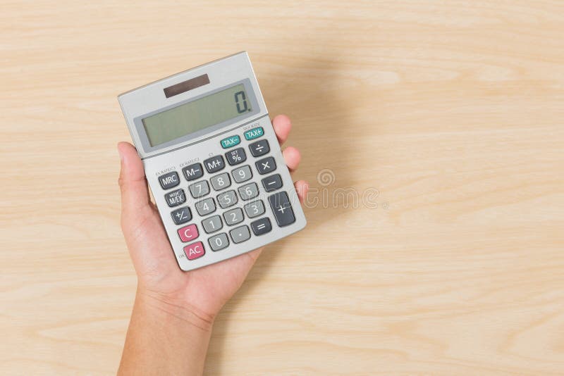 Hand Hold Calculator on Wood Background Stock Image - Image of people ...