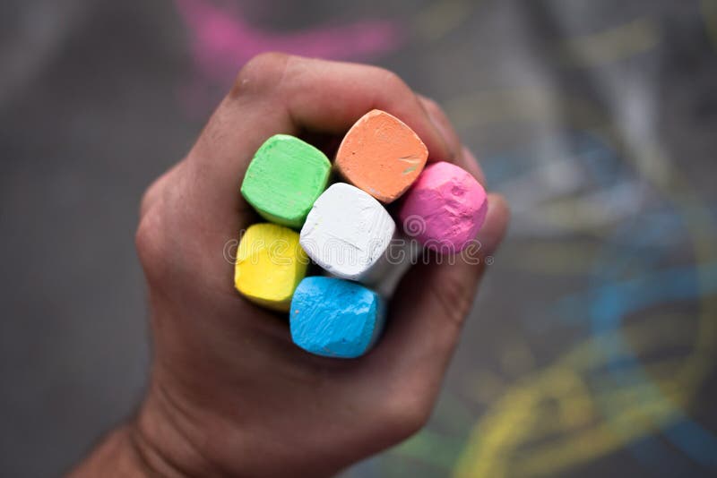 Hand hold colored chalk stock photo. Image of crayon - 23854380