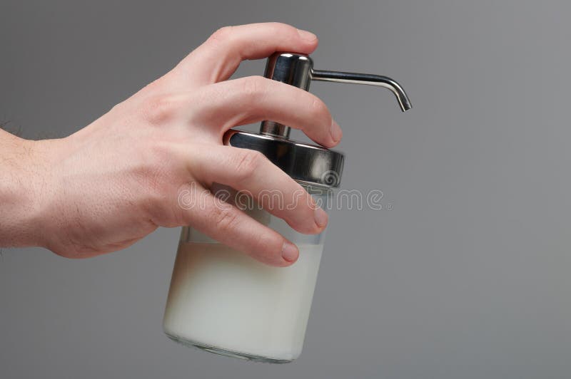 Hand hold dosing container stock image. Image of applying - 176162273