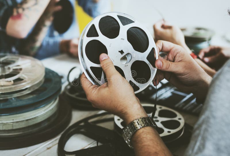 Hand hold a film strip stock photo. Image of tape, hands - 99982430