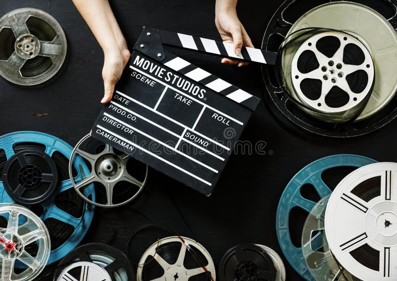 Hand hold a film strip stock photo. Image of hand, entertainment - 99983248