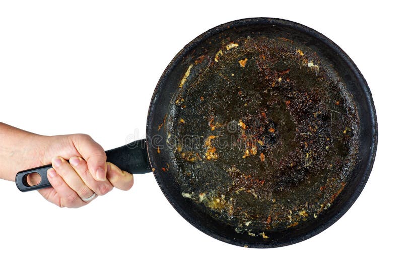 A Frying Pan with the Leftover Grease Isolated on a White Stock Photo ...