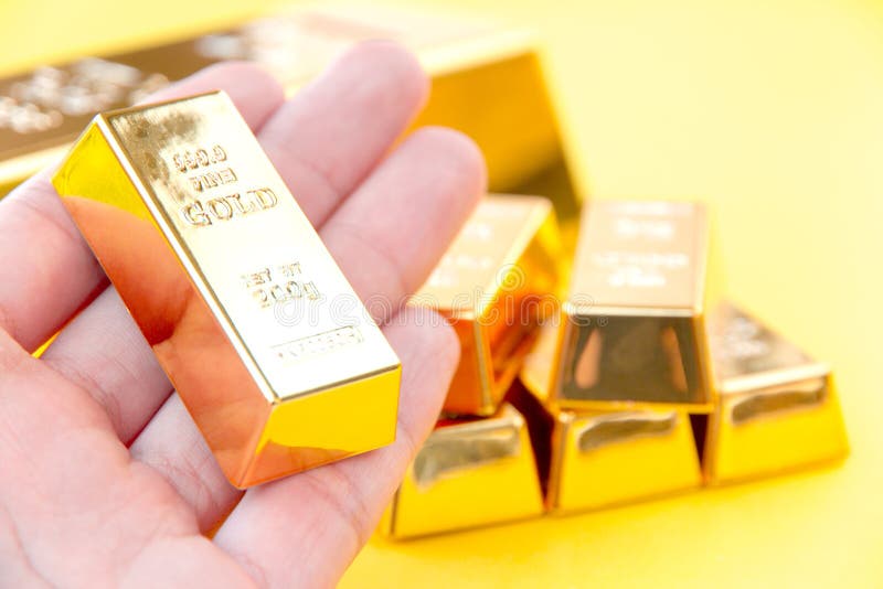 105 Hand Holding Gold Bars Stock Photos - Free & Royalty-Free Stock ...