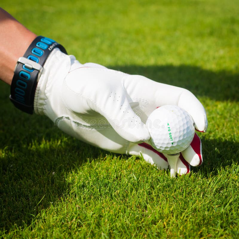Hand Hold Golf Ball with Tee on Course, Close Up Stock Image - Image of ...