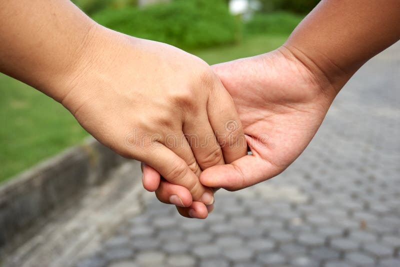 Hand hold hand stock image. Image of family, people, hold - 60946495