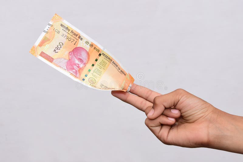 Hand Hold Indian Currencies 100 and 200 Rupee Notes White Background ...