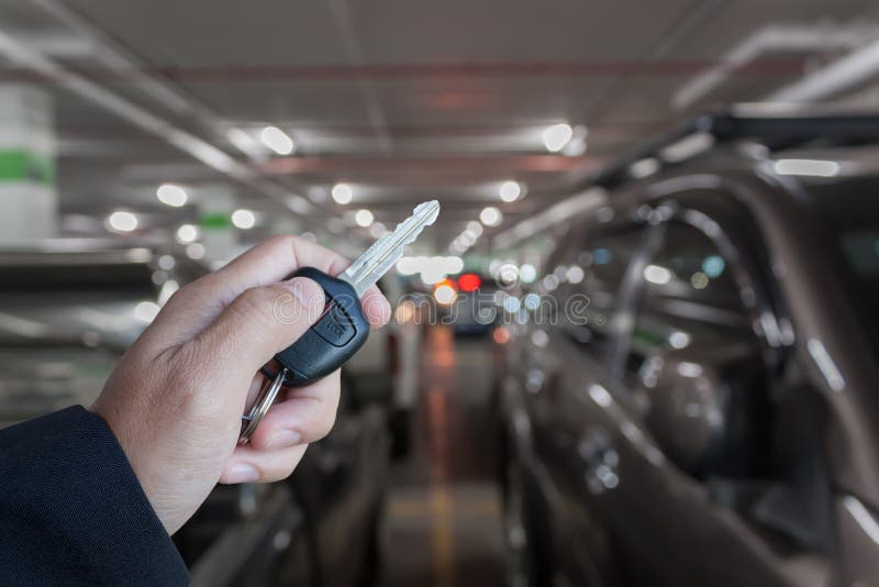 Hand Hold Key Blur Car Parking Stock Image - Image of business ...