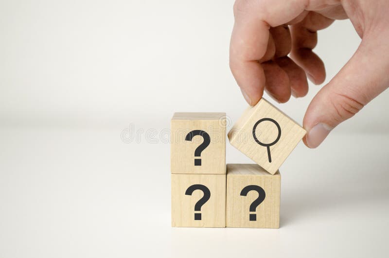Hand Hold Magnifying Glass and Question Mark Sign Icon in Wooden Cube ... Hand Hold Magnifying Glass and Question Mark Sign Icon in Wooden Cube ...