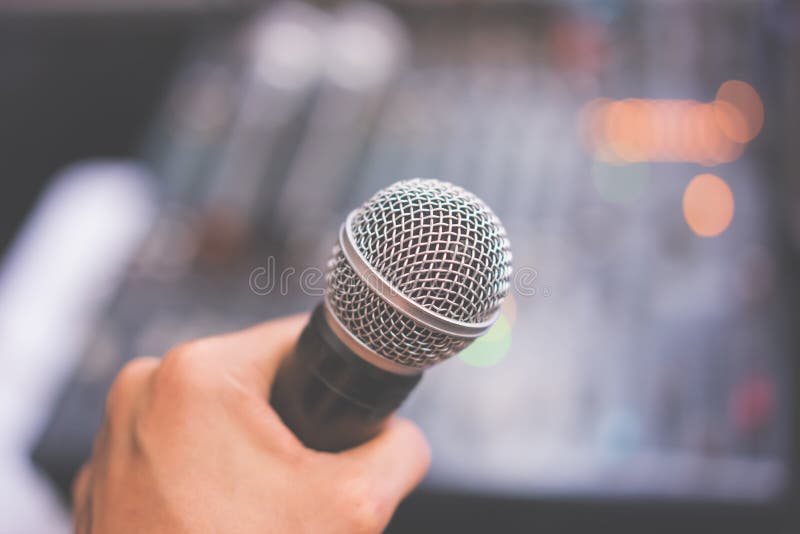 Hand Hold Microphone in Hall with Mixer Control Stock Image - Image of ...