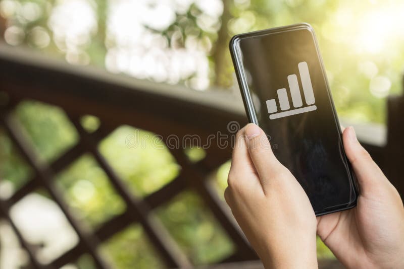 Hand Hold Mobile Phone with Chart on Screen. Business Stock Image ...