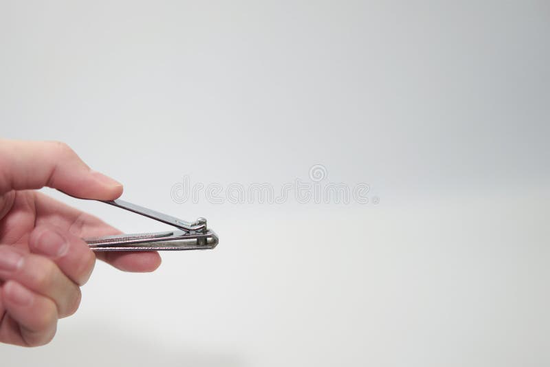 Hand Hold Nail Clipper or Cutter Isolated on White Stock Image - Image ...