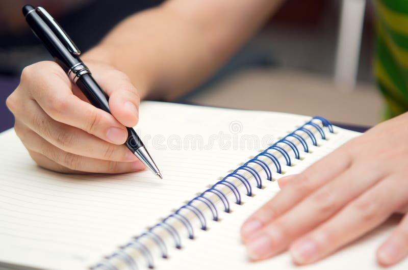 Hand Hold a Pen and Write on a Book Stock Image - Image of letter ...