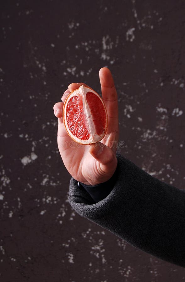 Hand hold Red Citrus fruit stock image. Image of fruit - 48072457