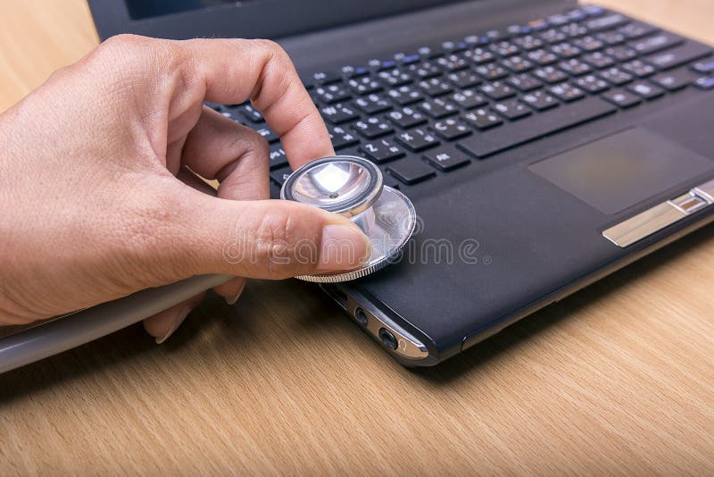 Hand Hold Stethoscope Over Computer Computer Maintenance Concept Stock ...