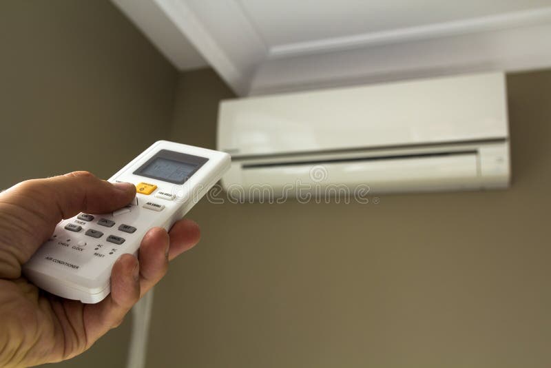 Hand Holdind Control Switch of Home Air Conditioner Stock Image - Image ...
