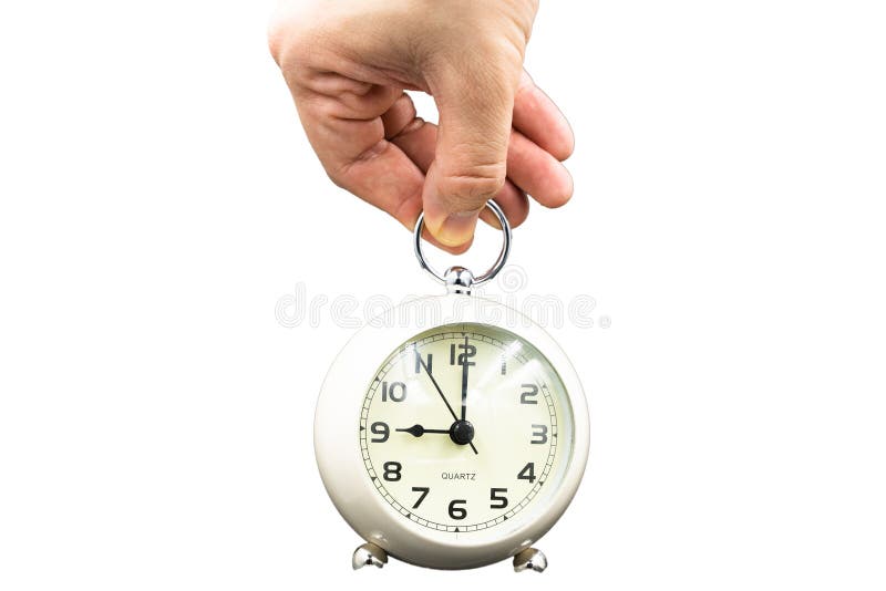 Hand holding alarm clock stock photo. Image of alarm - 174574502