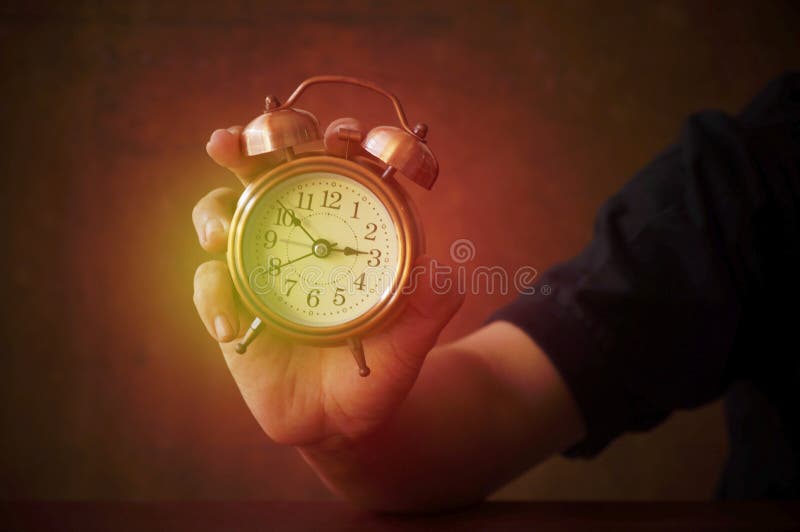 Hand holding alarm clock stock image. Image of male, woman - 84968757