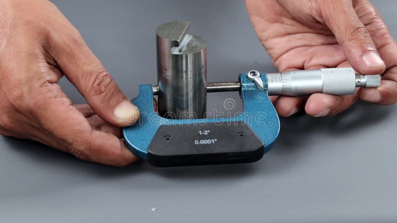 Hand Holding Analogue Micrometer or Diff Micrometer Quality Control ...