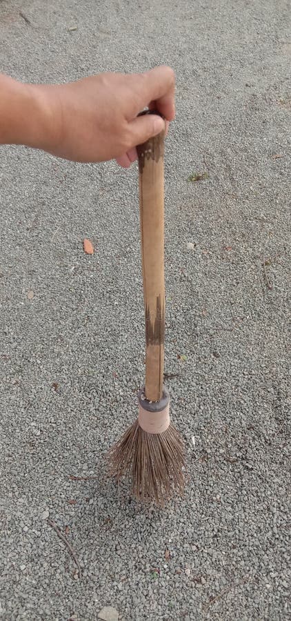 The Hand Holding the Ash Brown Broom Stock Image - Image of hand, broom ...