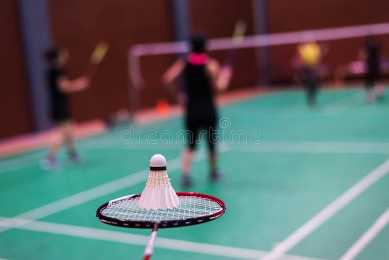 Hand Holding Badminton Racket and Shuttlecock in Badminton Court Stock ...