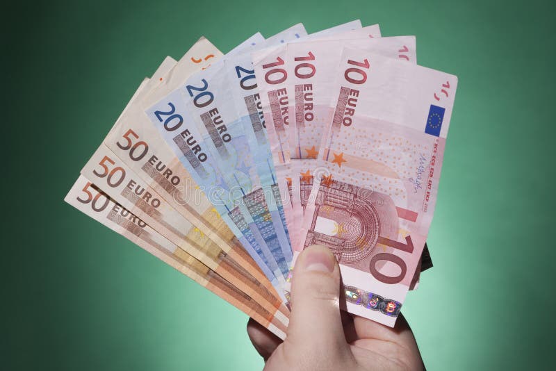 Hand holding bank notes stock photo. Image of hand, note - 39500422