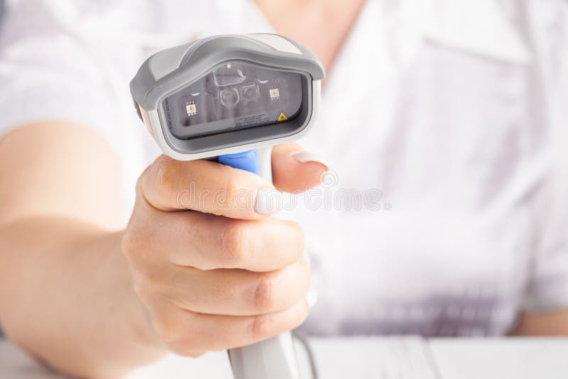 Hand Holding Barcode Scanning. Selective Focus Stock Image - Image of ...