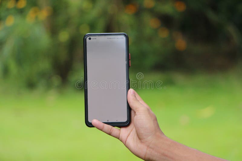 Hand Holding a Big Touchscreen Android Smart Mobile Phone Stock Photo ...