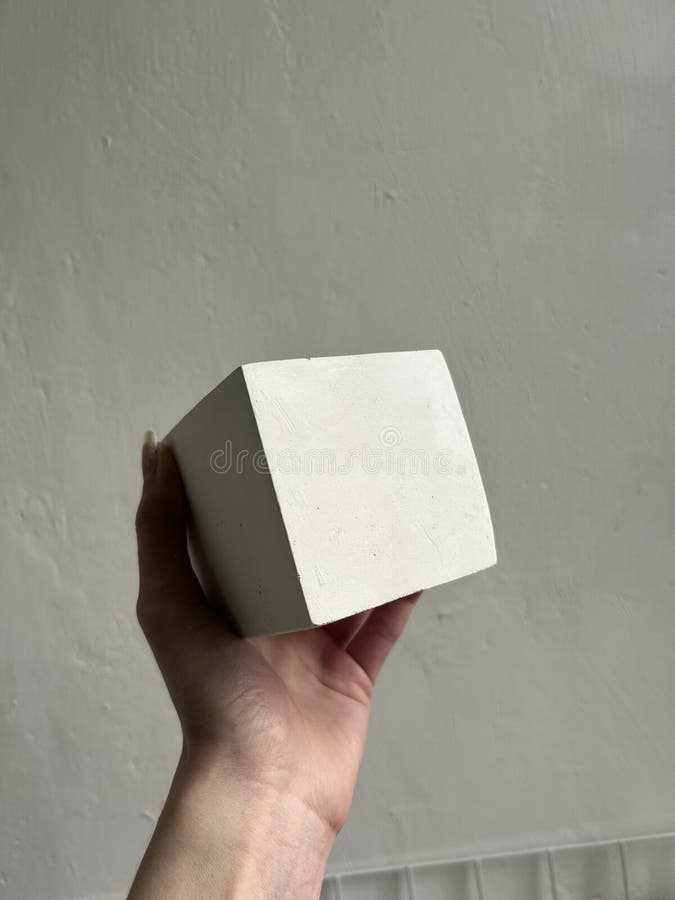 Hand Holding the Big White Cube Stock Photo - Image of holding, hand: 302109774