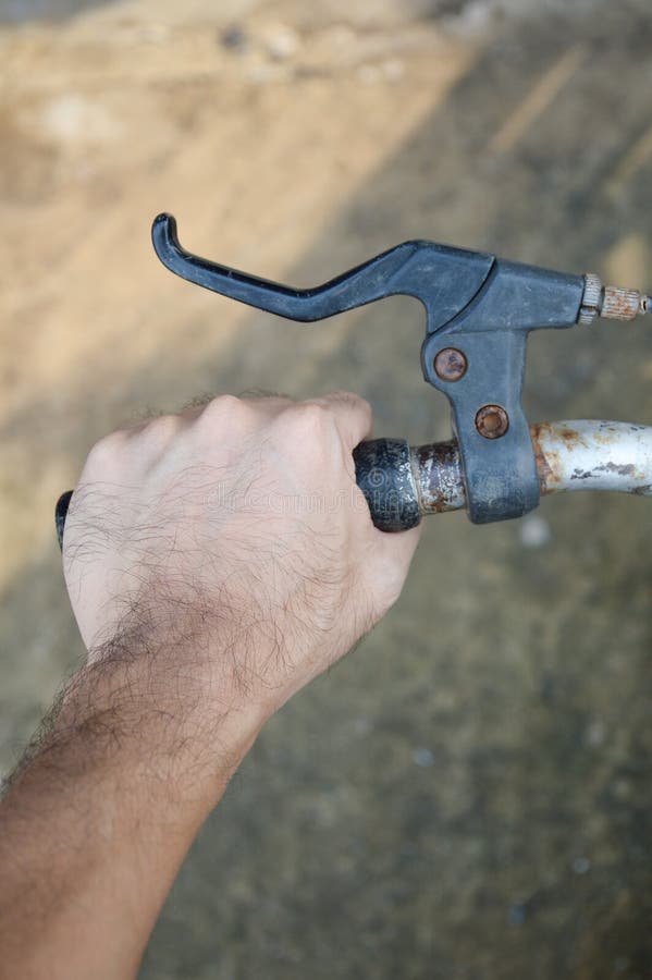 Hand Holding on Bike Handle Stock Image - Image of hand, entertainment ...