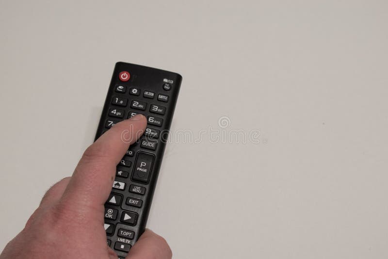 Hand Holding Black Multimedia Tv Remote Control Stock Photo - Image of ...