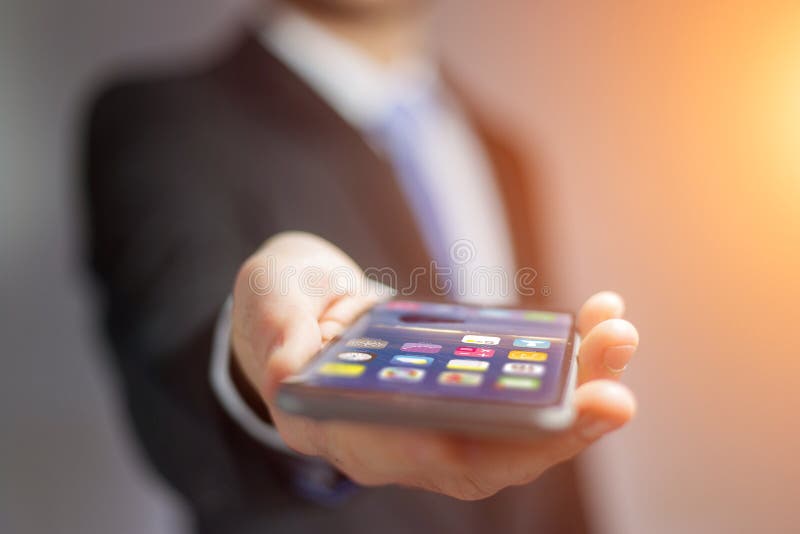 Hand Holding Black Smartphone with Operating System Screen Stock Image ...