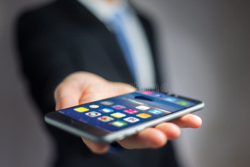 Hand Holding Black Smartphone with Operating System Screen Stock Photo ...