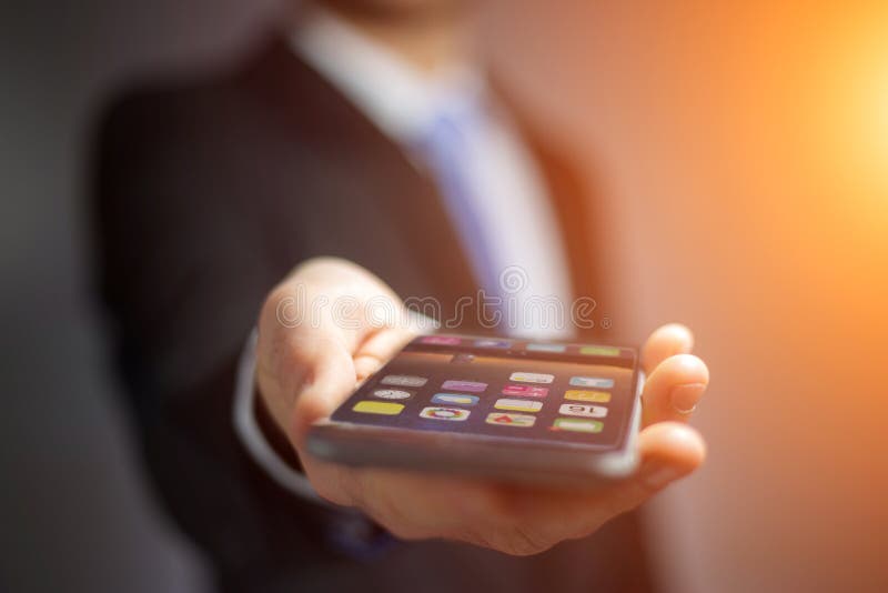 Hand Holding Black Smartphone with Operating System Screen Stock Image ...