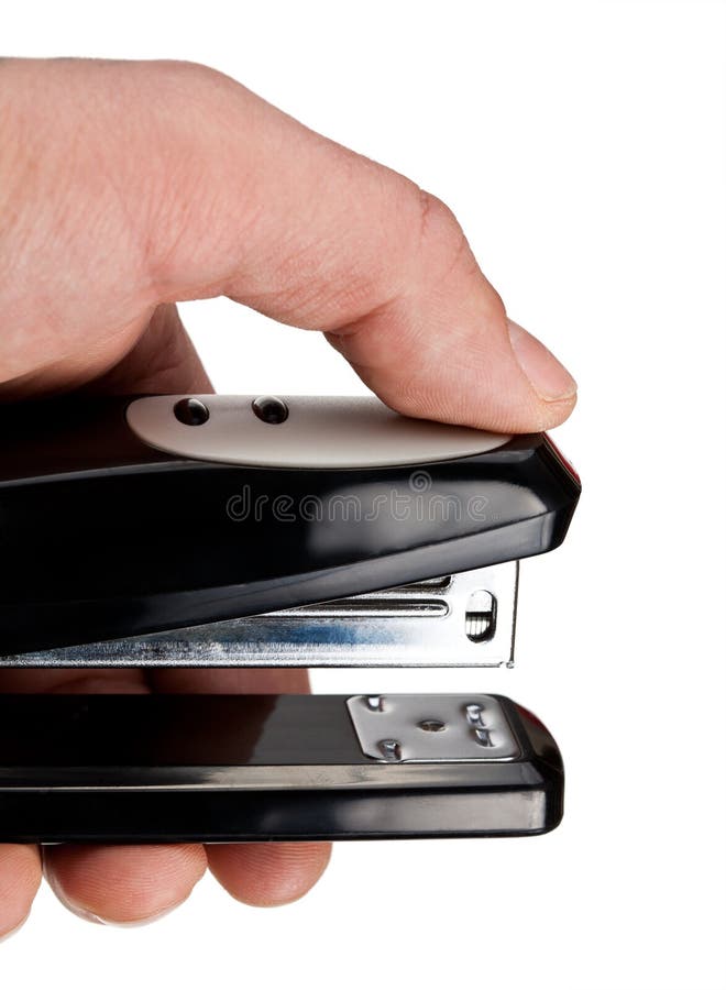 Hand holding black stapler stock photo. Image of businesses - 29001026