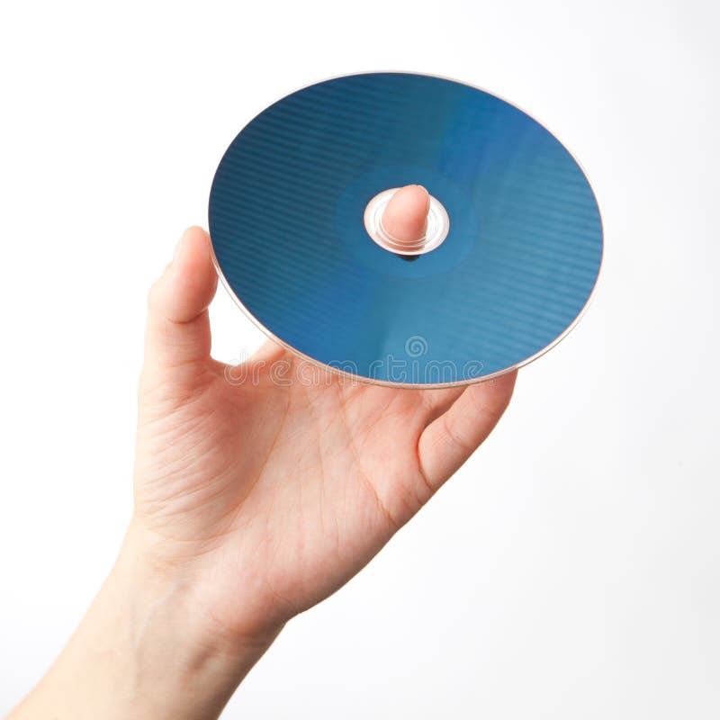 Hand holding blu-ray disk stock image. Image of circle - 23947365